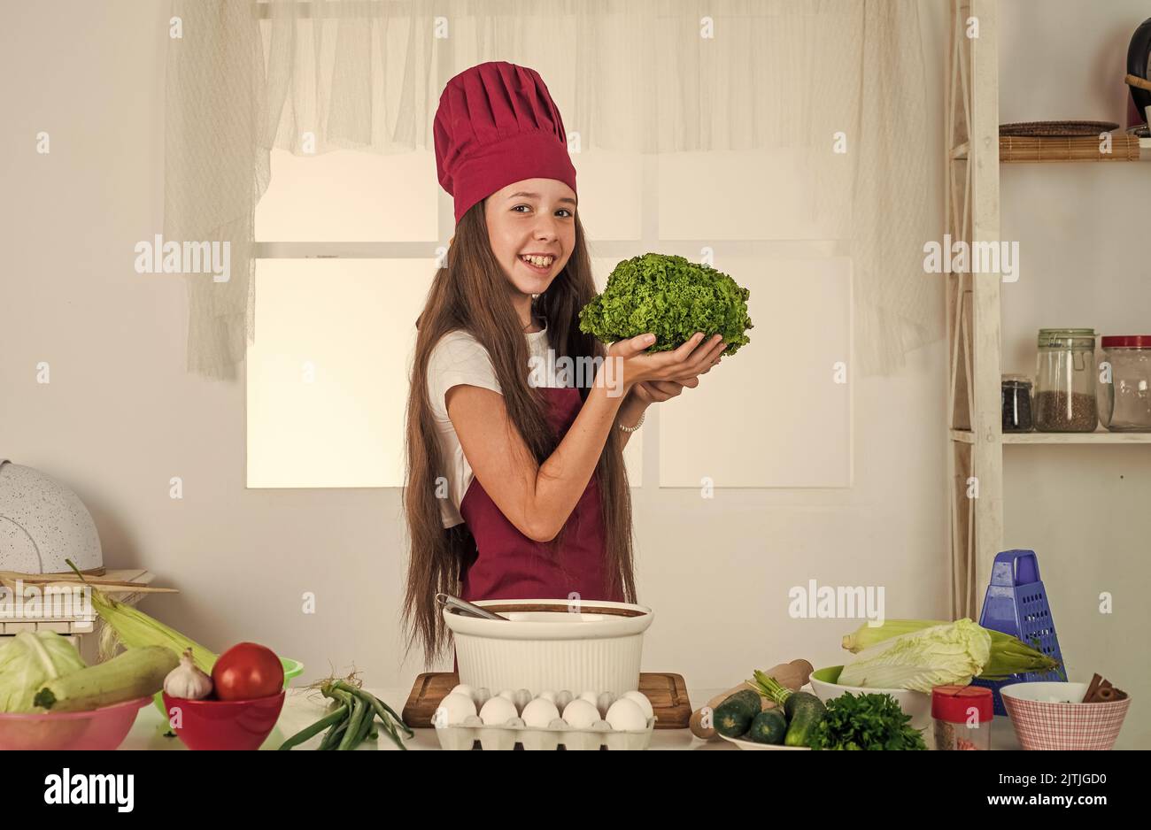 organic food. choosing a career. little helper with fresh vegetables ...