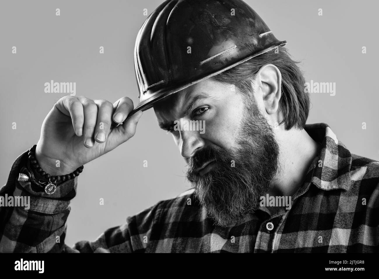 Used to look perfect. hipster on construction site. engineering concept ...