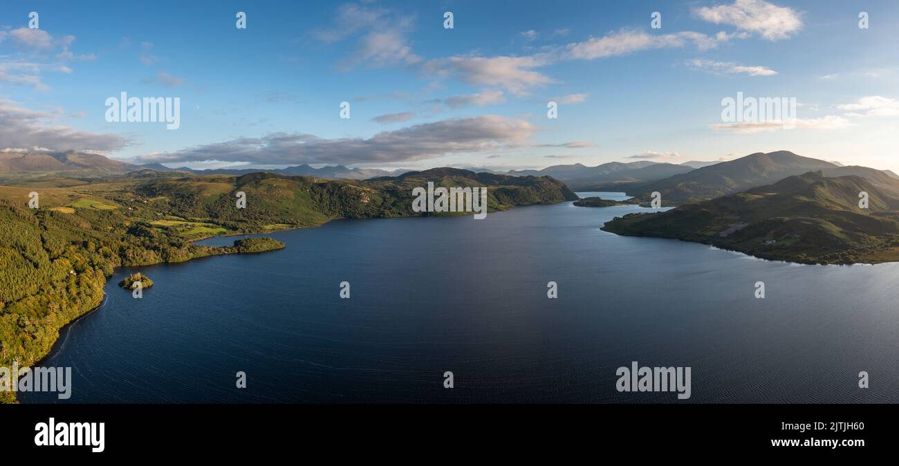 A panorama view of Lough Caragh lake in the Glencar Valley of Kerry ...