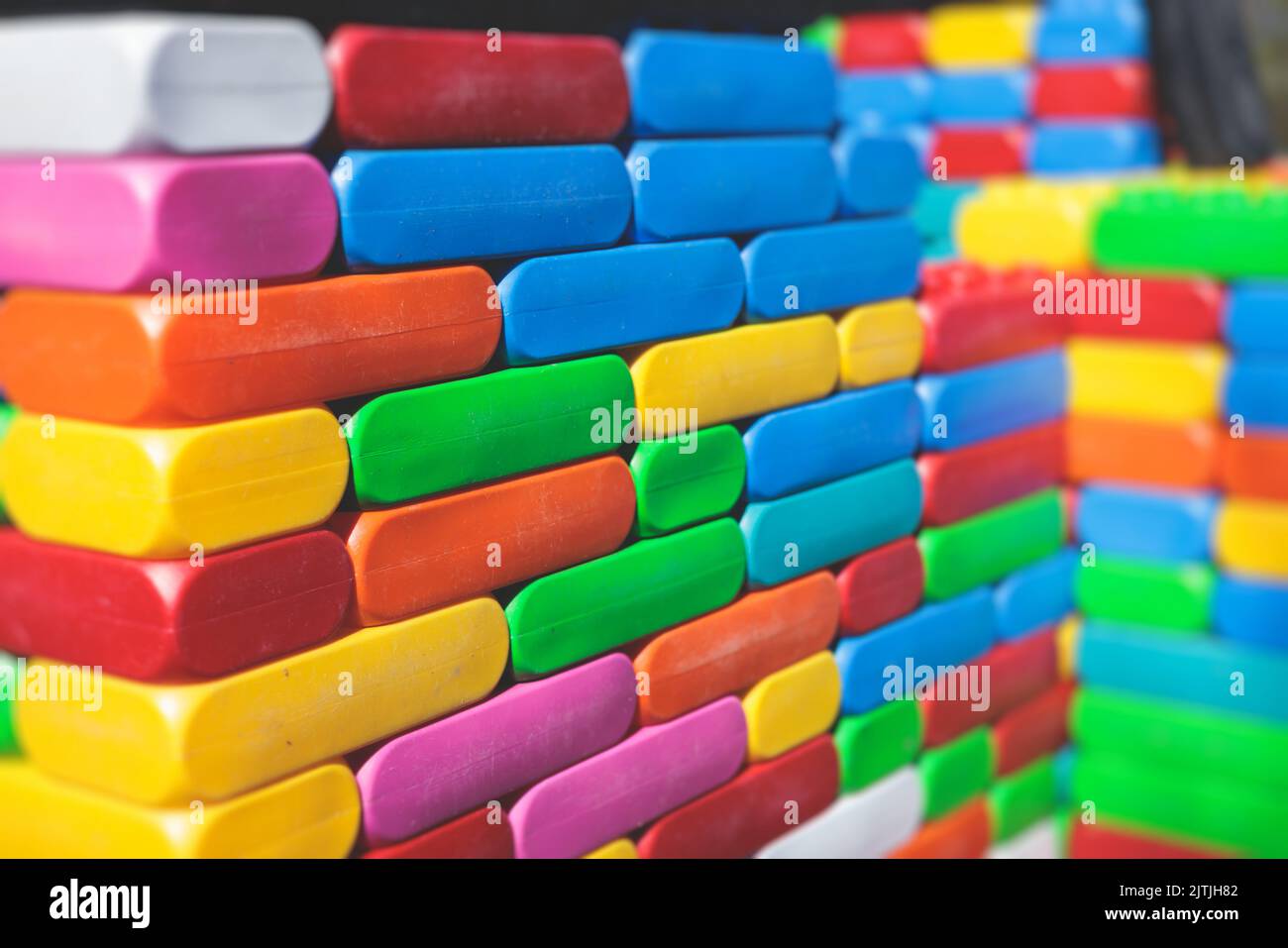 Children play colorful big toy blocks in kindergarten day care center ...