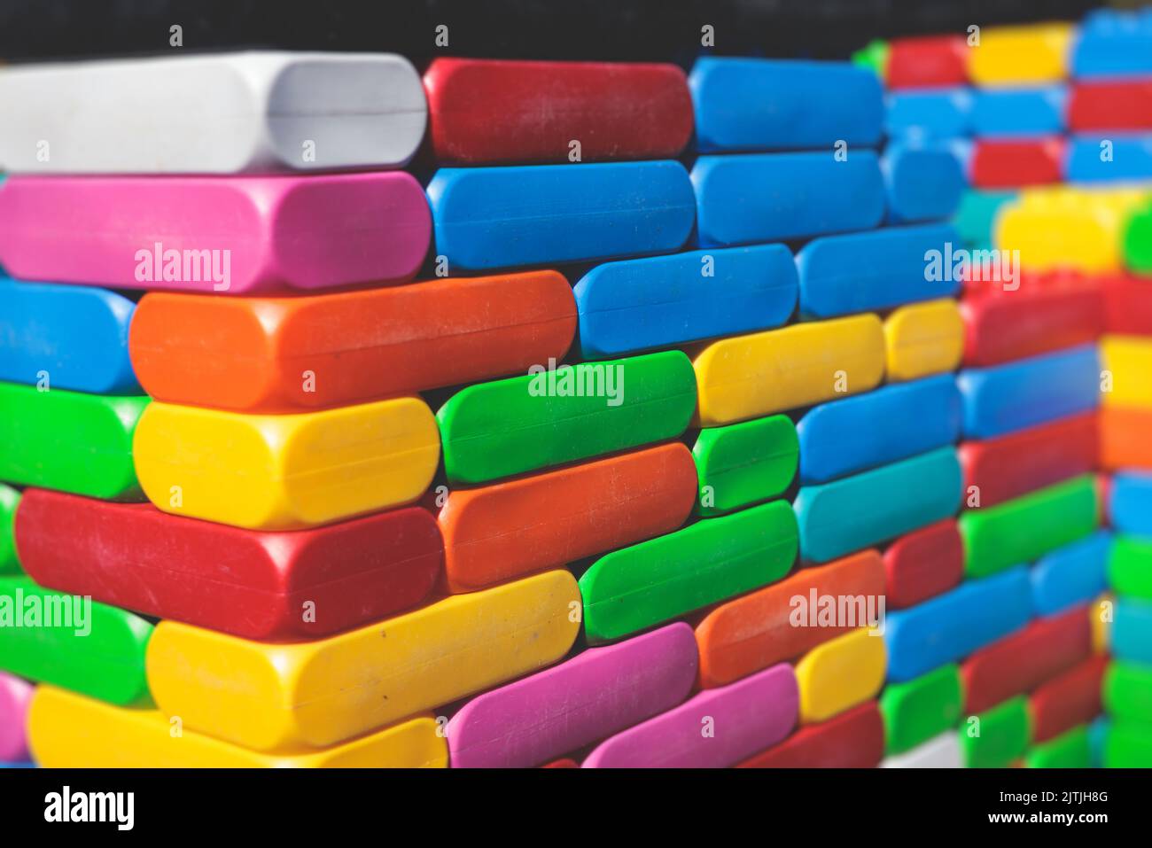Children play colorful big toy blocks in kindergarten day care center ...