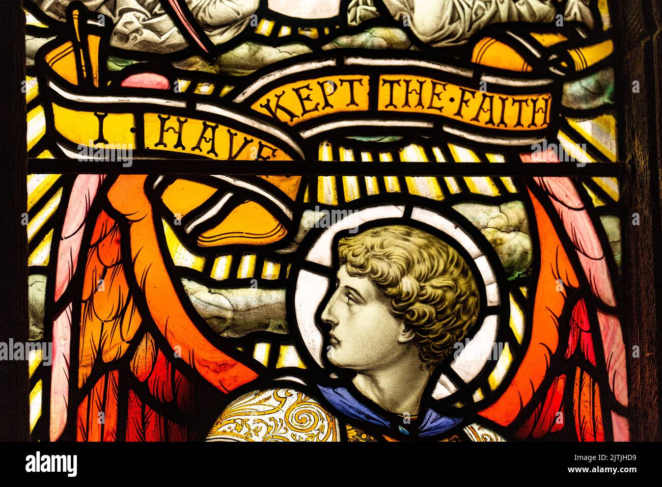 A stained glass window featuring scripture and knights, European design ...