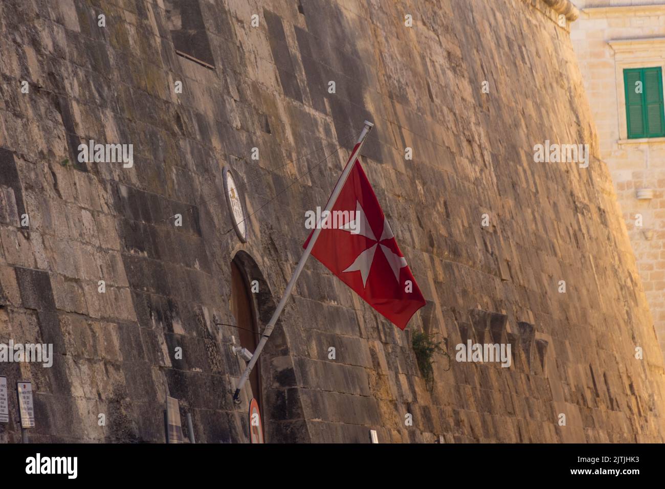 Flag of the Sovereign Military Order of Malta right outside the main ...