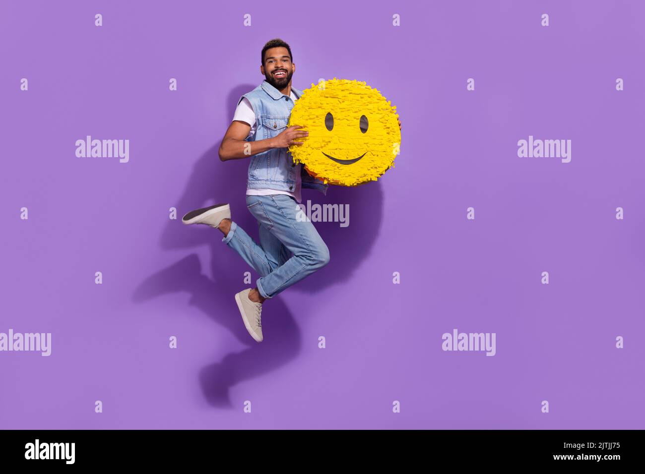 Full length photo of sweet funky guy dressed denim vest rising smiley ...