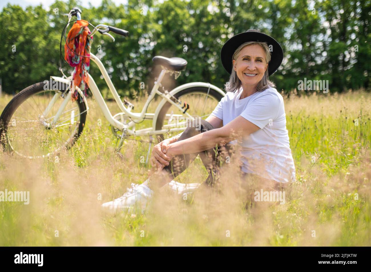 Woman happy energetic grass hi-res stock photography and images - Alamy