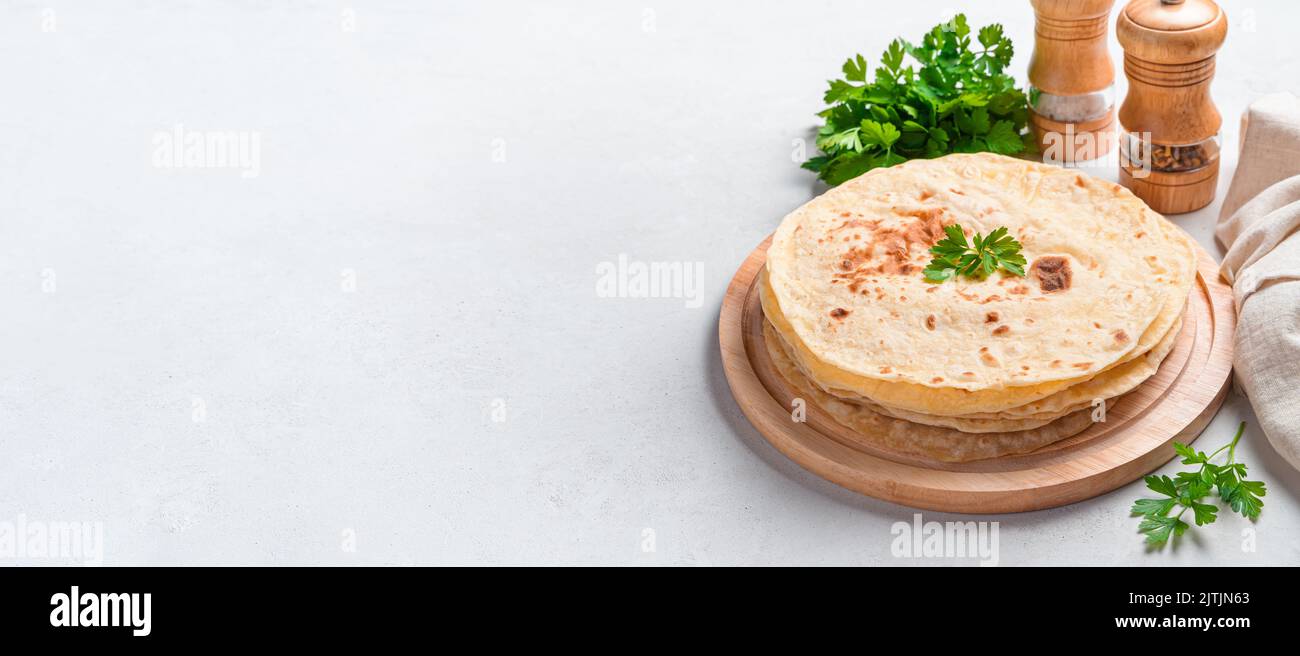 Indian, traditional chapati tortillas with fresh parsley on a Stock ...