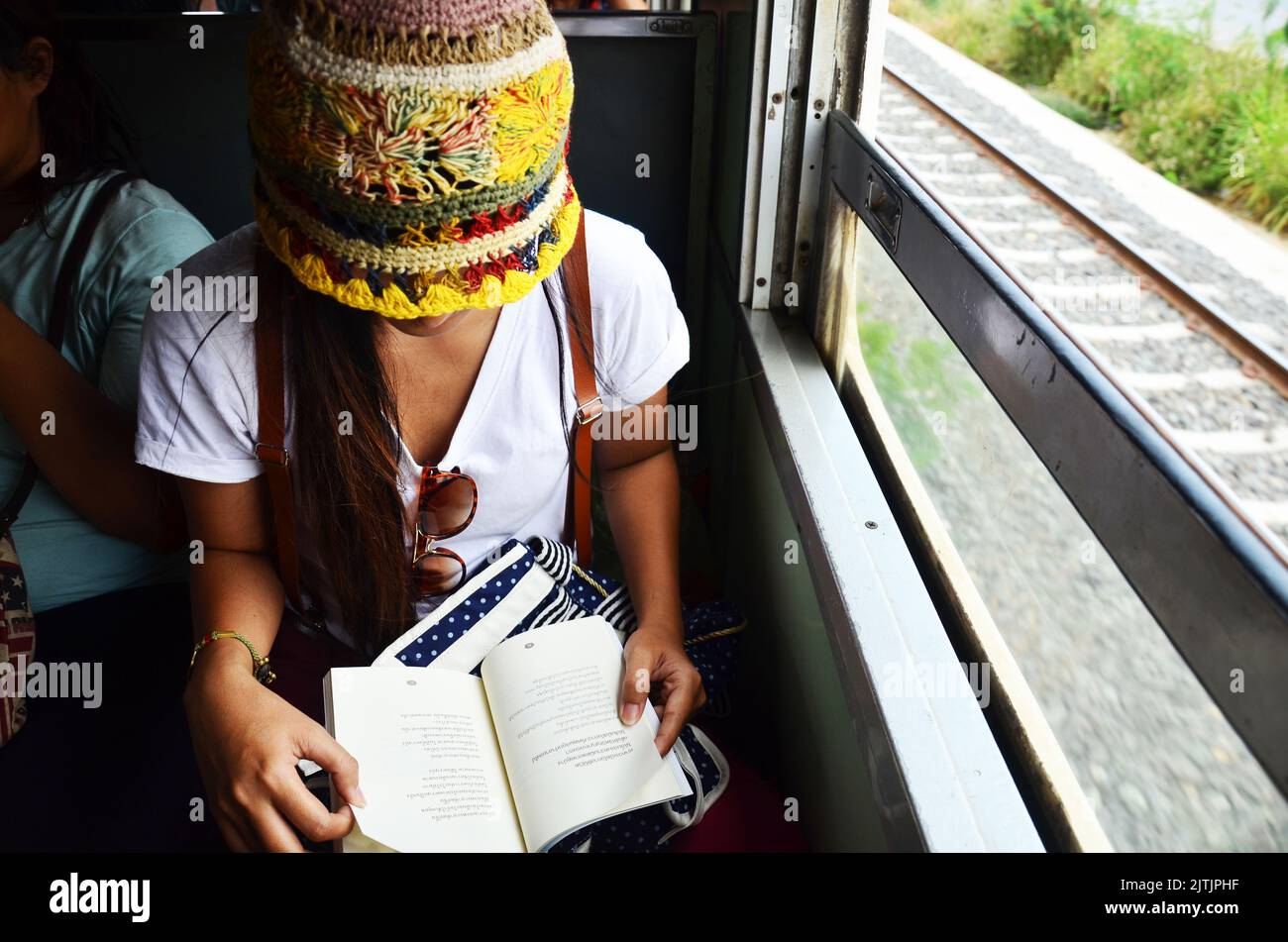 Traveler thai women people sitting on railway for journey explorer and ...