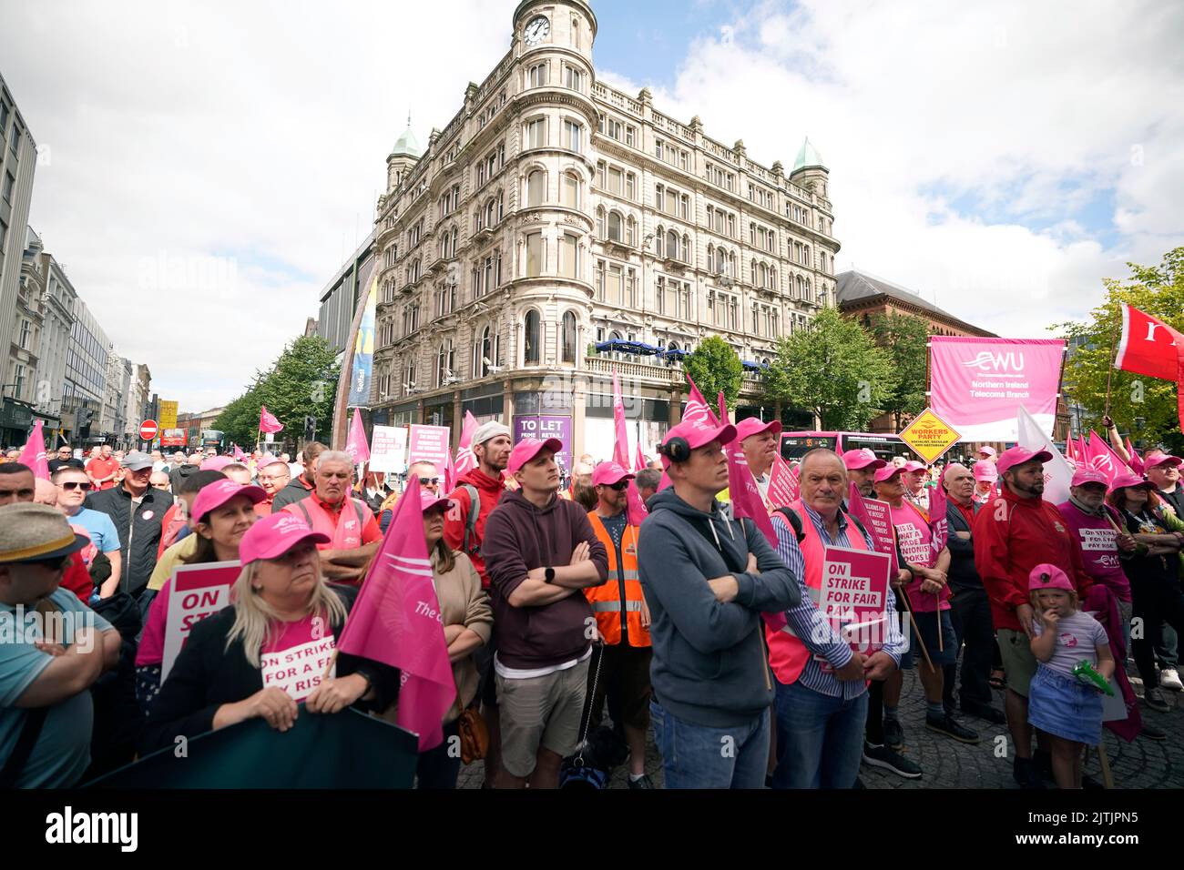 Members of the Communication Workers Union (CWU) demonstrate during a ...