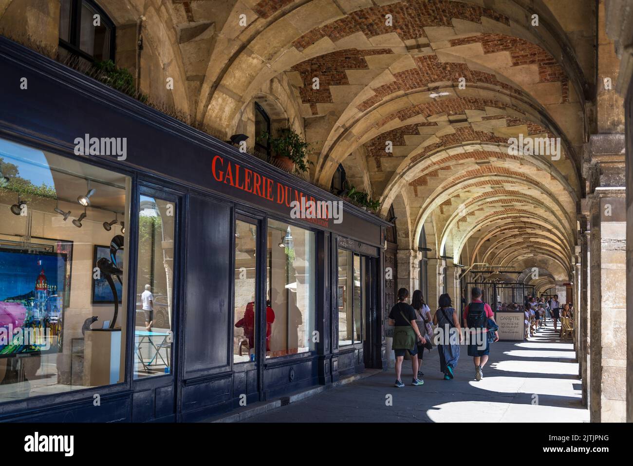 Art gallery in the Arcades of the Place des Vosges, the oldest planned ...