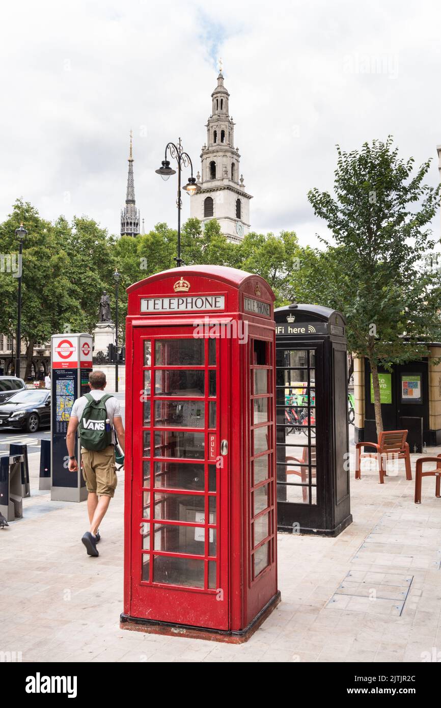 Telephone kiosks and the church tower of Sir Christopher Wren's St ...