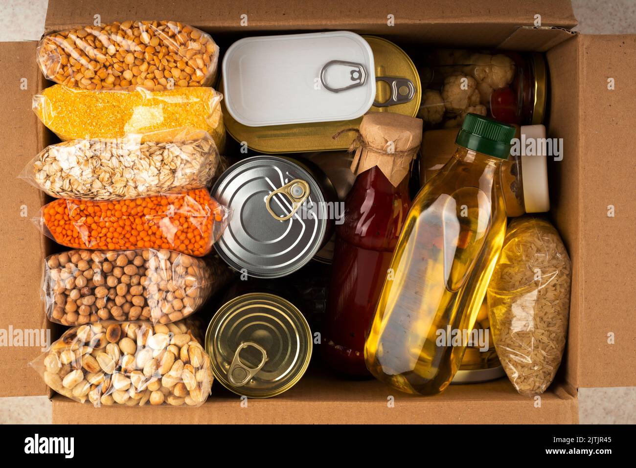 Survival set of nonperishable foods in carton box Stock Photo - Alamy