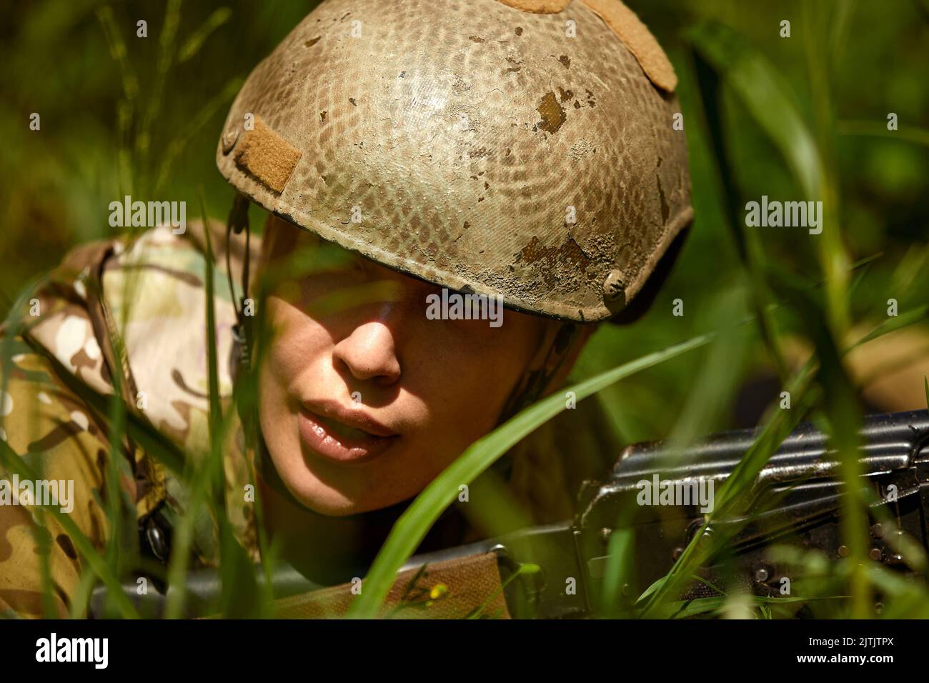Caucasian Military lady woman in tactical gear posing for photo at ...