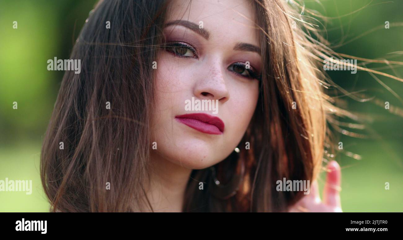 Young millennial woman in 20s headshot portrait face posing. Pretty ...