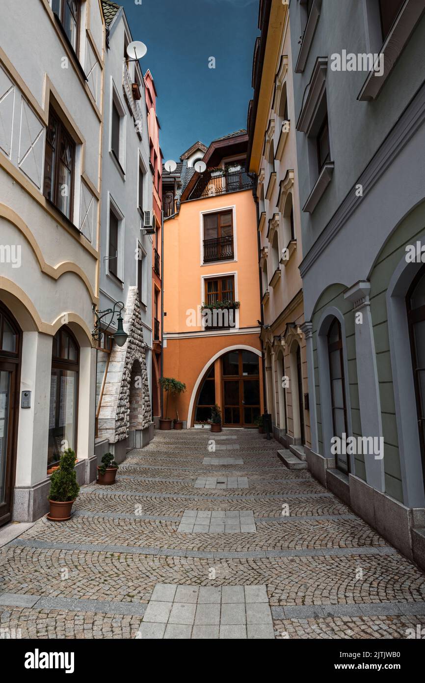 Narrow street in European town Stock Photo - Alamy