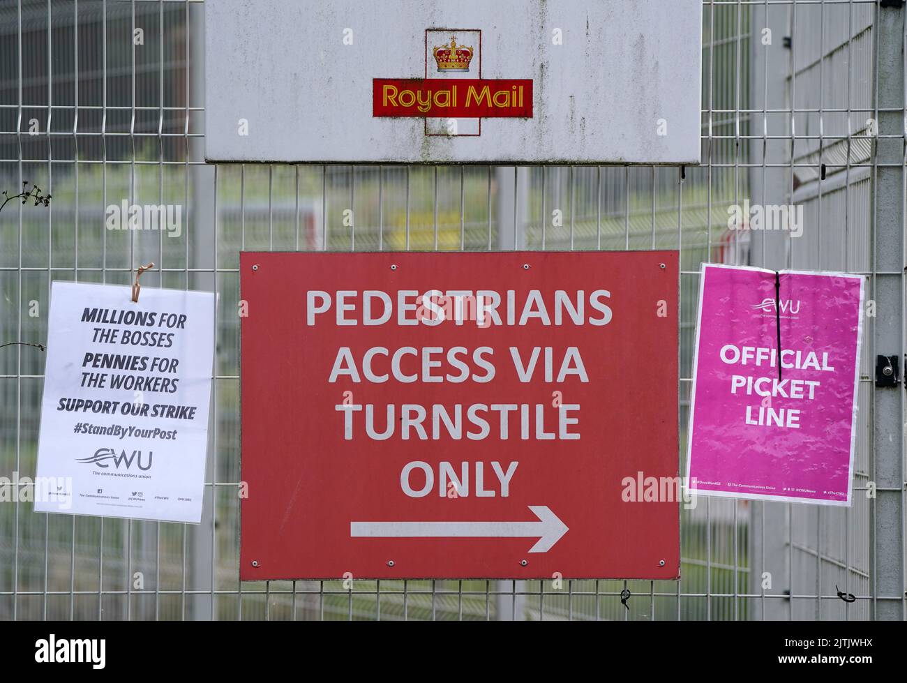 Signage at the Glasgow Mail Centre as Royal Mail workers from the ...