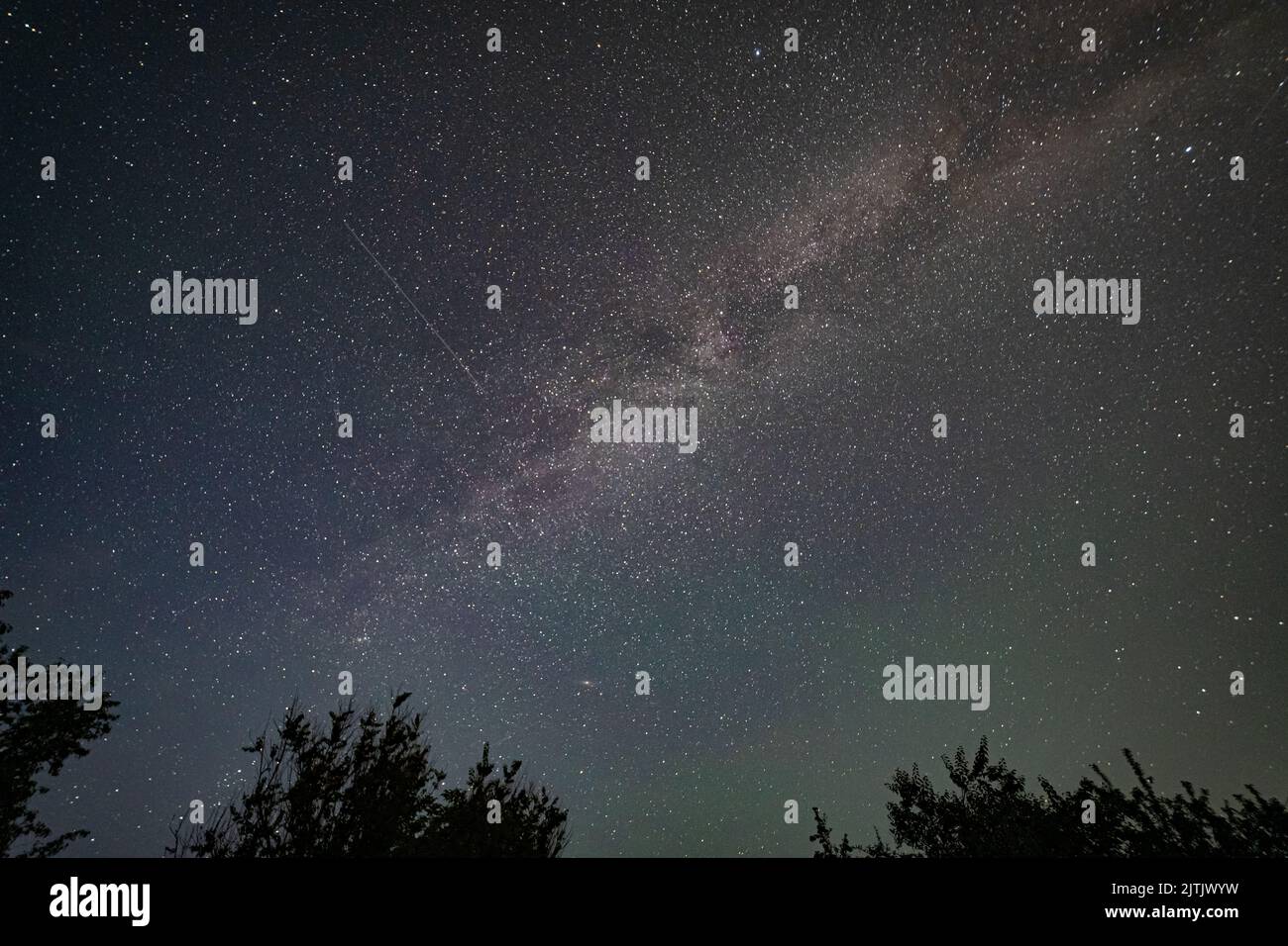 Milky Way and Stars Moving Across the Night Sky Stock Photo - Alamy