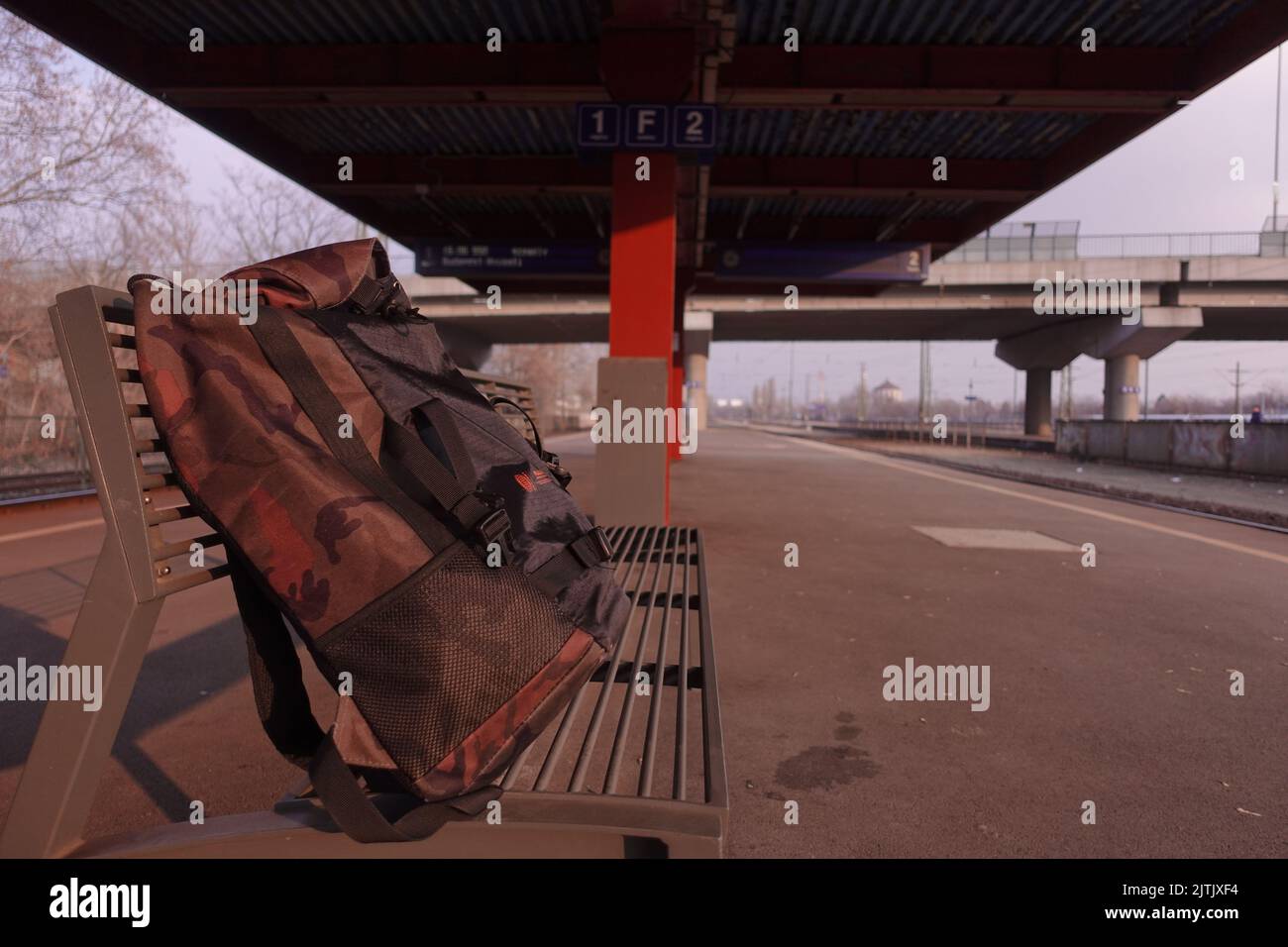 Lost unattended backpack on a bench without people around Stock Photo ...