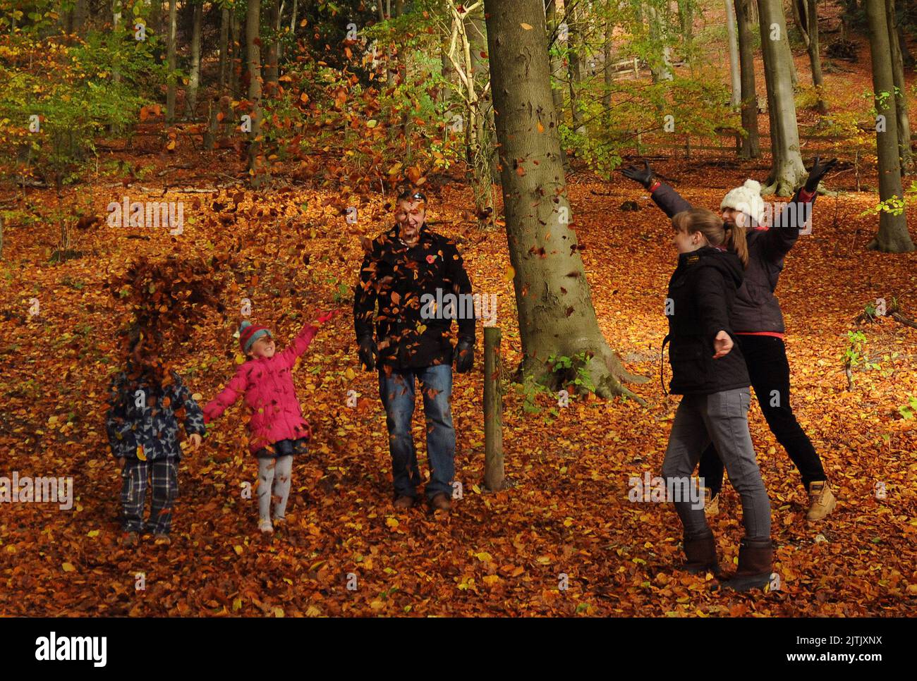A FAMILY HAVE FUN ON AN OUTING DESPITE THE COLD WEATHER. THIS FAMILY ...