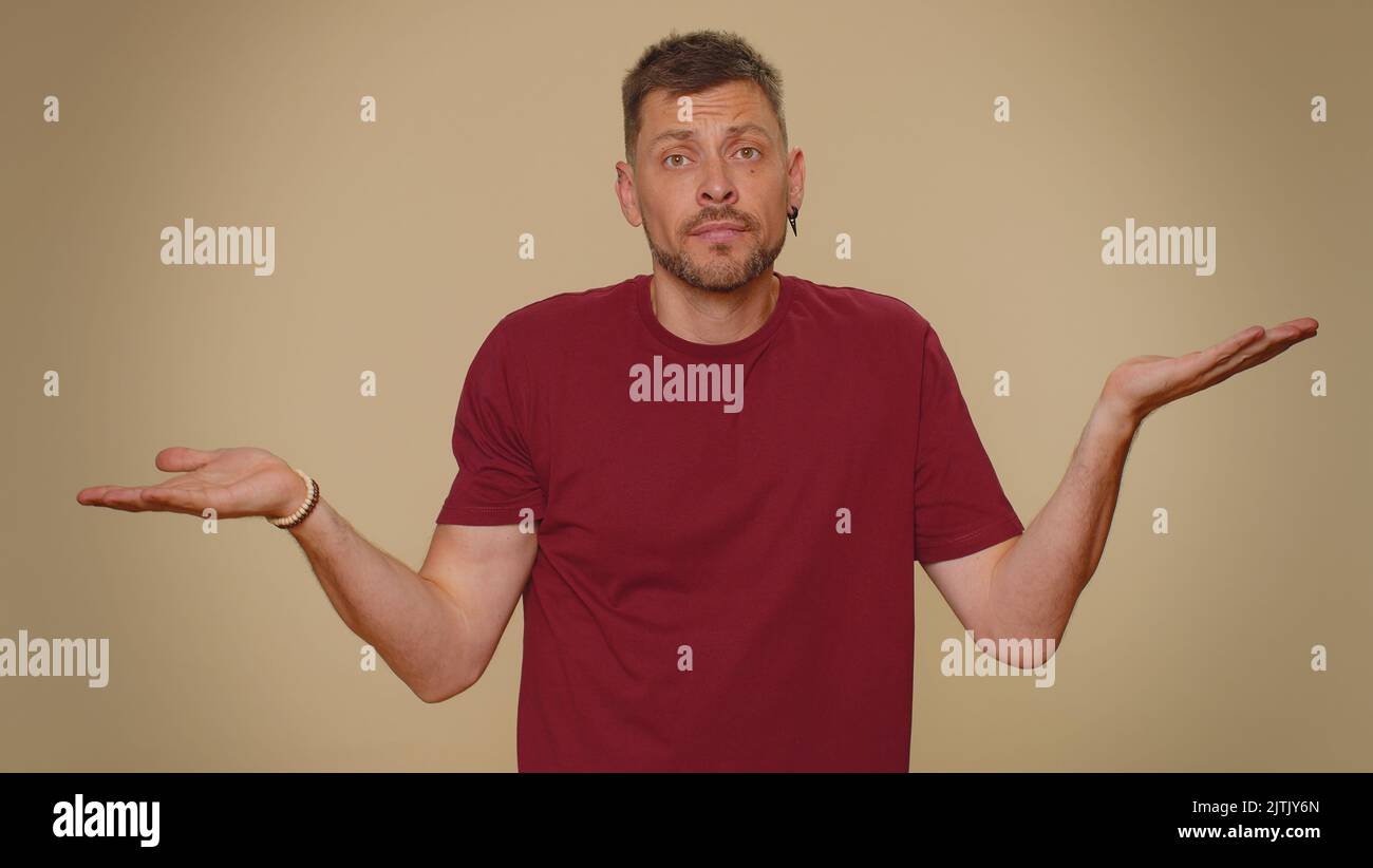 Confused handsome man feeling embarrassed hi-res stock photography and ...