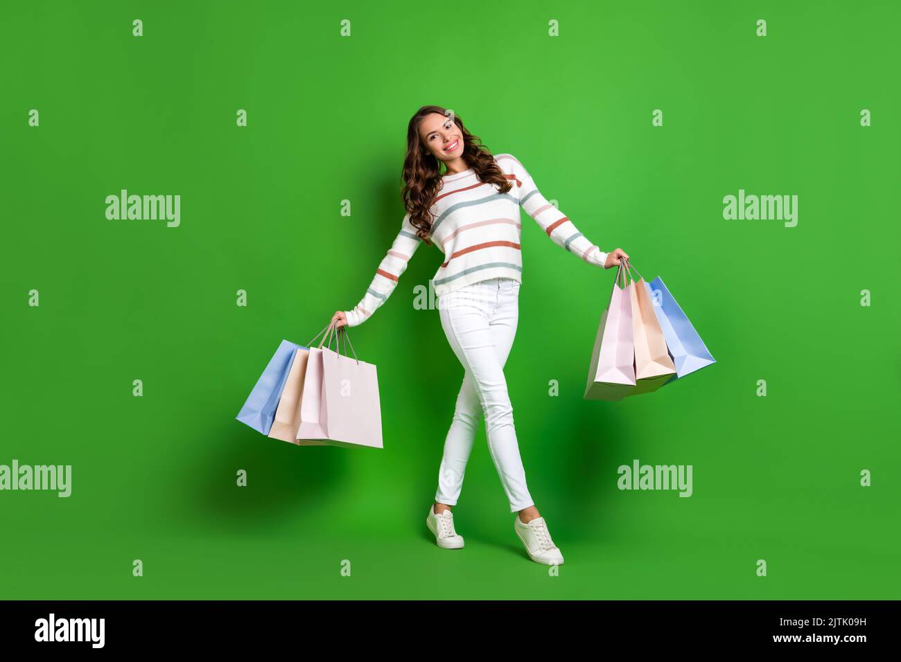 Full length photo of cute pretty girl dressed striped pullover walking ...