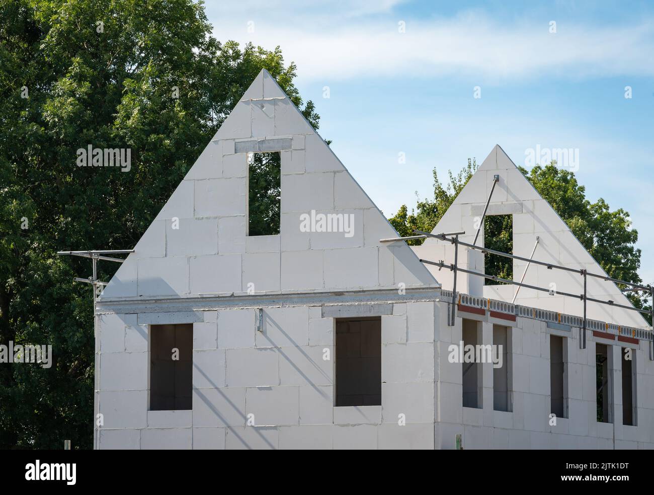 Building a new house. Frame of modern house in process of construction ...