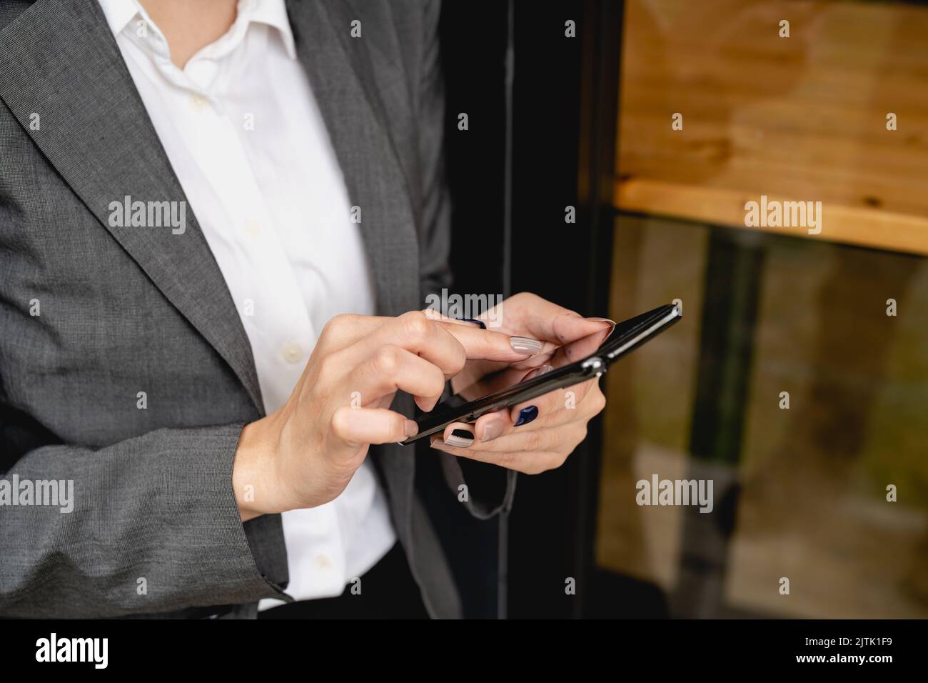 point finger on screen mobile phone closeup, person texting text ...