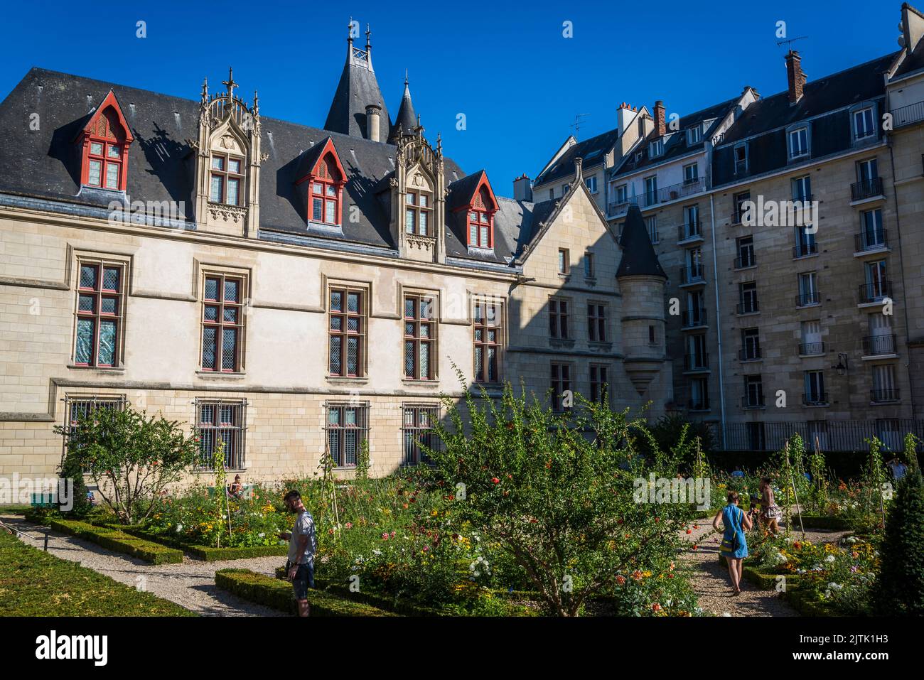 Hôtel de Sens garden, a formal garden with Gothic-style villa with ...