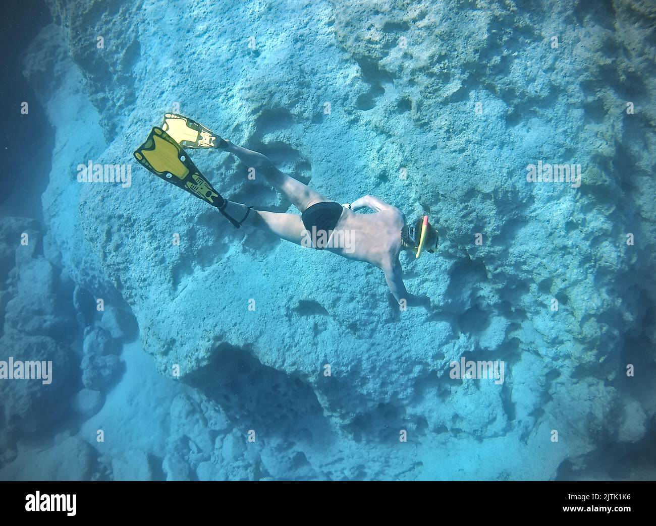 Diving in the blue Stock Photo - Alamy