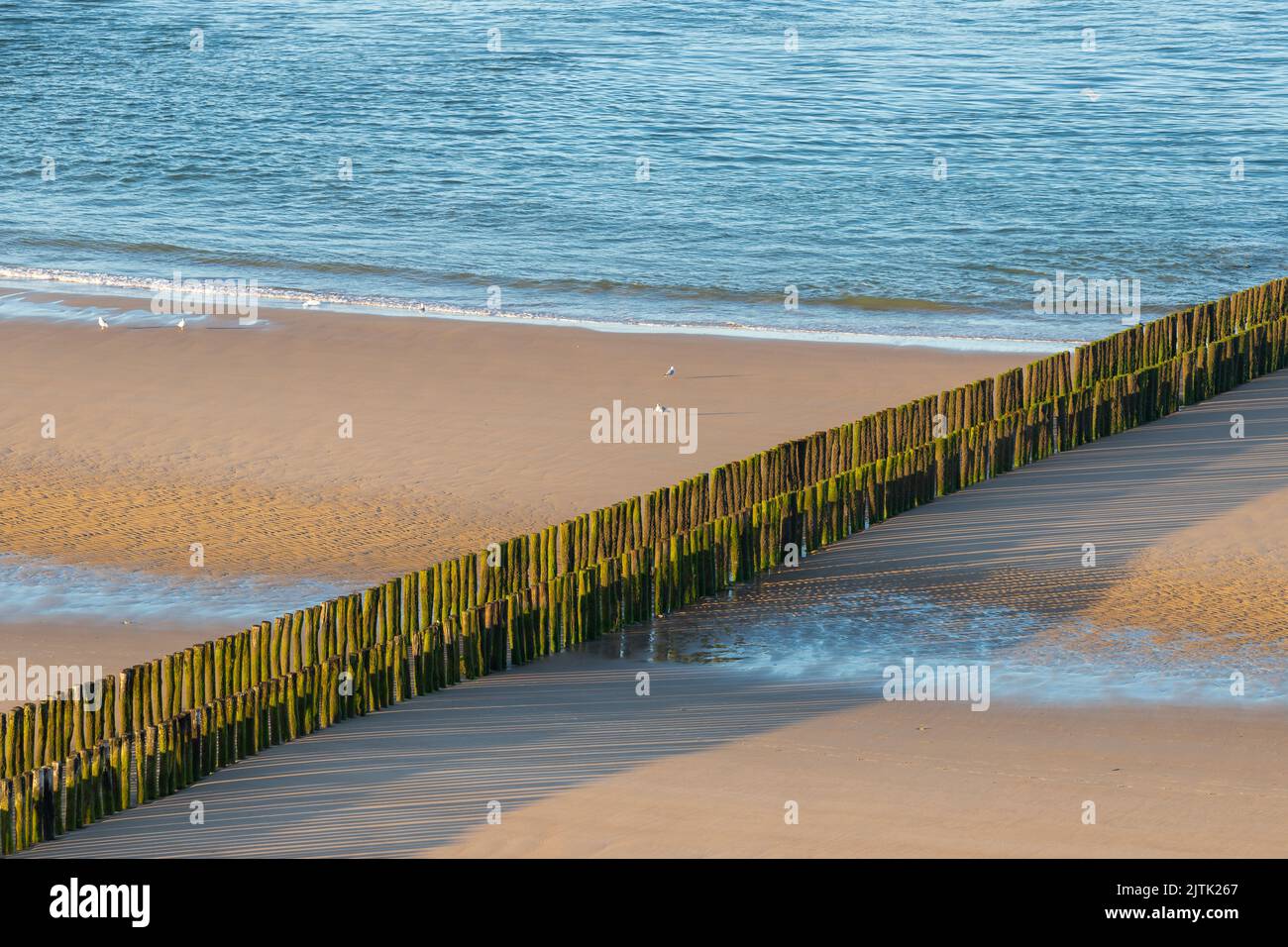 Rocks on the zeeland coast of the netherlands hi-res stock photography ...