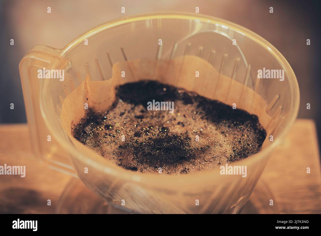 Vintage style of coffee in the morning. Close up of ground coffee in a ...