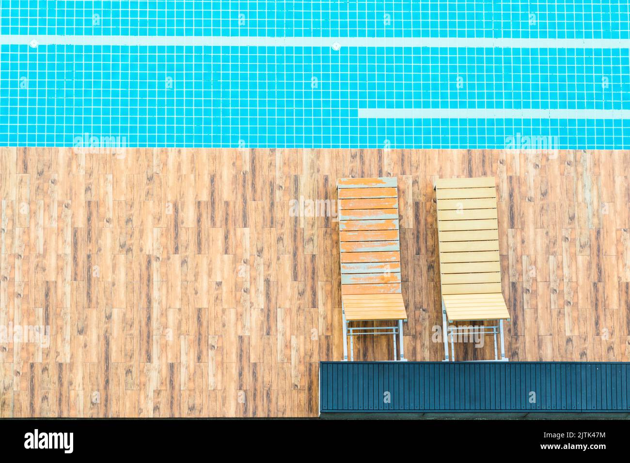 Minimal style, Top view of a swimming pool with a wooden floor and ...