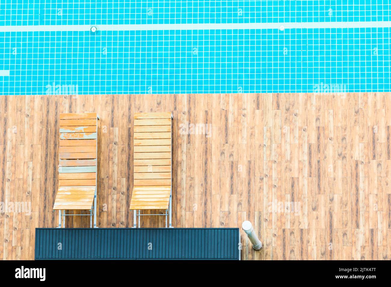 Minimal style, Top view of a swimming pool with a wooden floor and ...