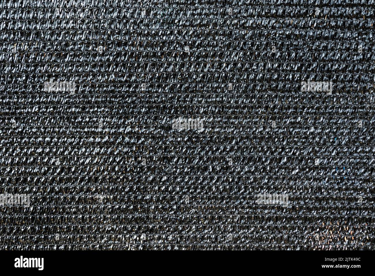 background of black shading net. Texture of plastic look plain and hard ...