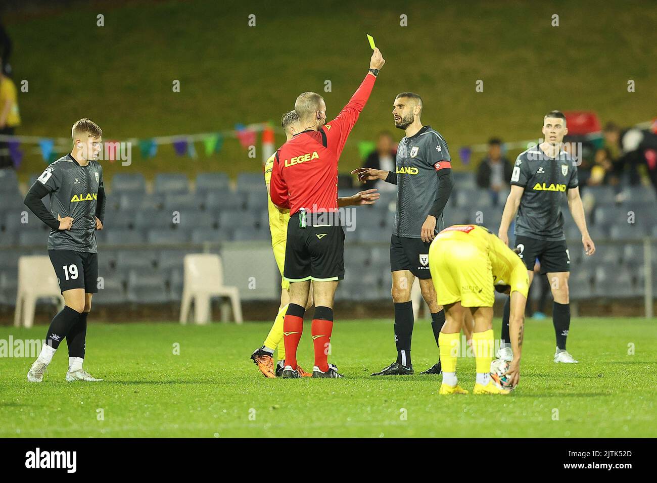 Referee shows yellow card south hi-res stock photography and images - Alamy