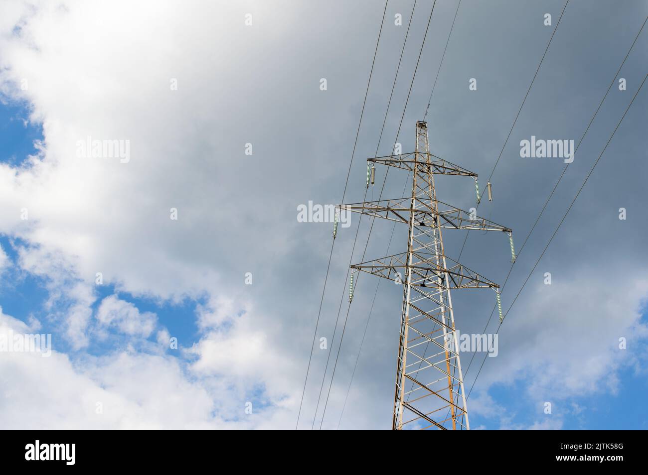Transmission tower of high voltage overhead power lines, symbol of ...