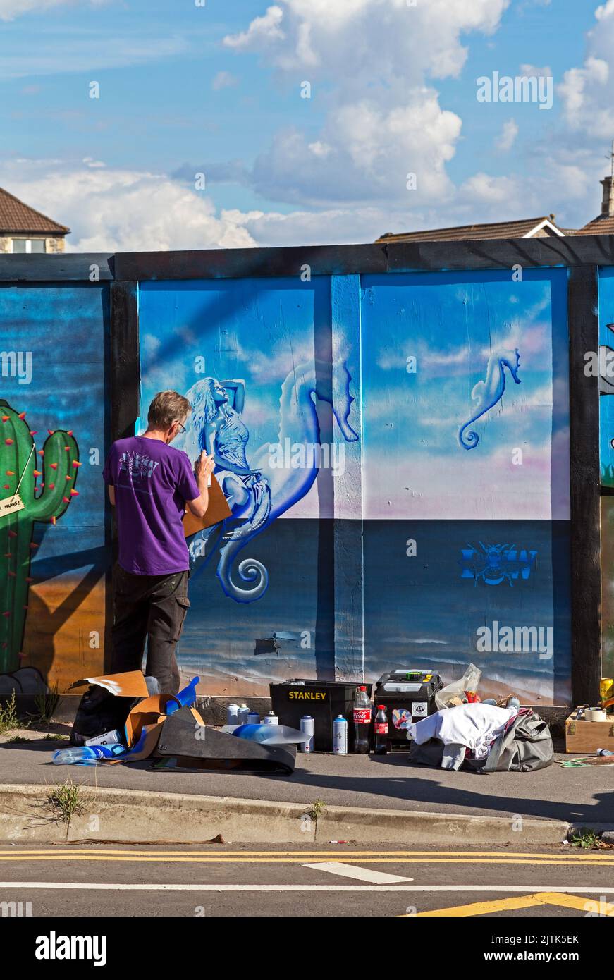 Weston-super-Mare, UK, 27 August 2022, Artist Ian Boyd Walker at work ...