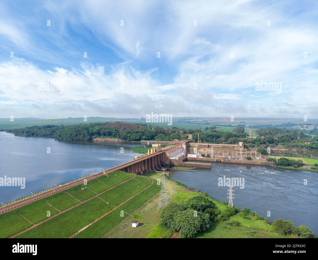 Aerial view of Dam at reservoir with flowing water, hydroelectricity ...