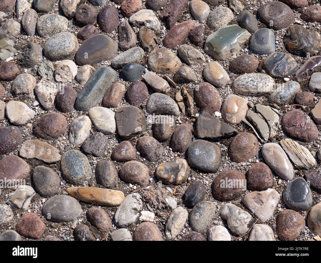 Path made of natural stone granite background Stock Photo - Alamy