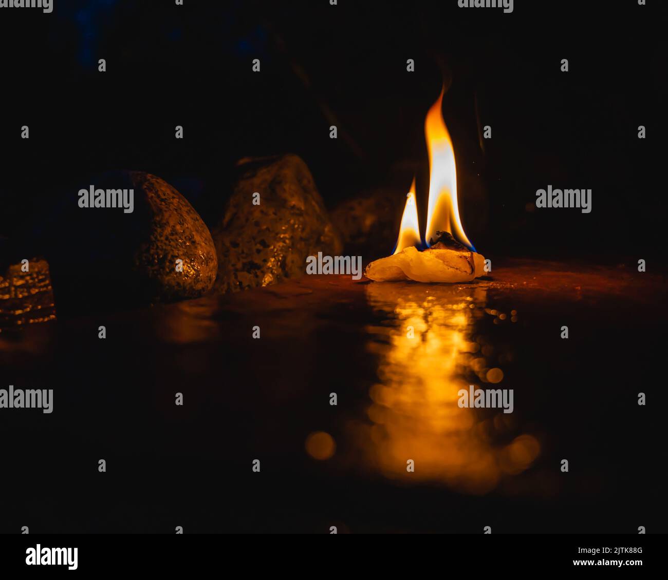 Candle in the rocks hi-res stock photography and images - Alamy