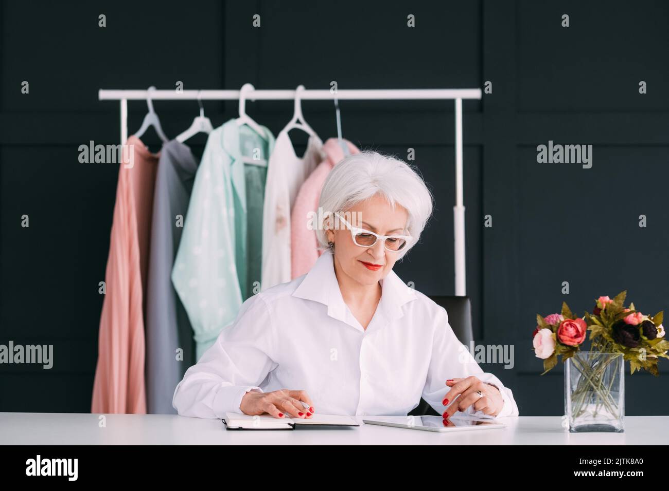 sucessful senior business woman fashion stylist Stock Photo - Alamy