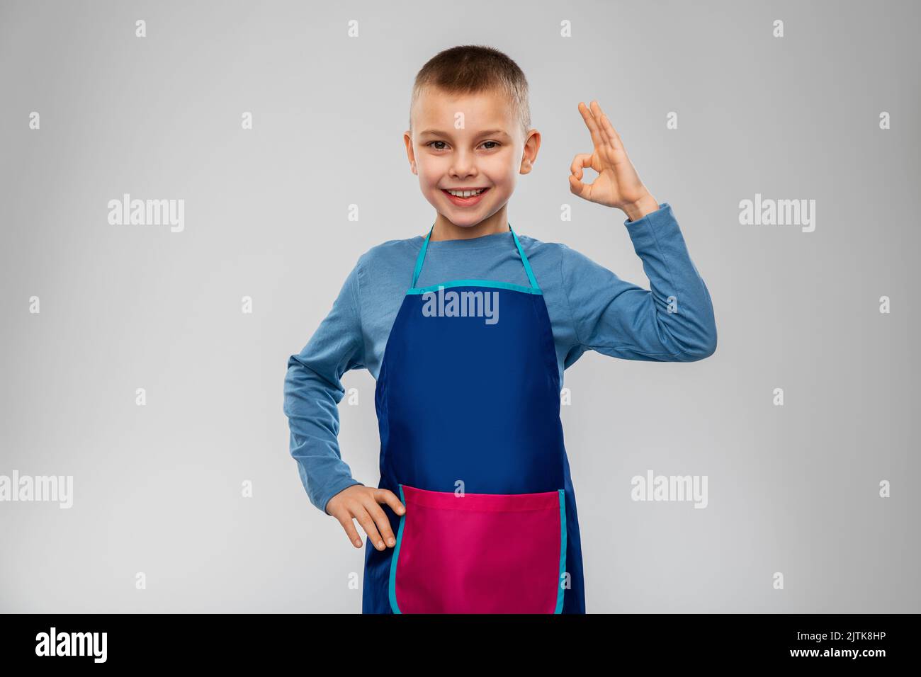 Boy apron hi-res stock photography and images - Alamy