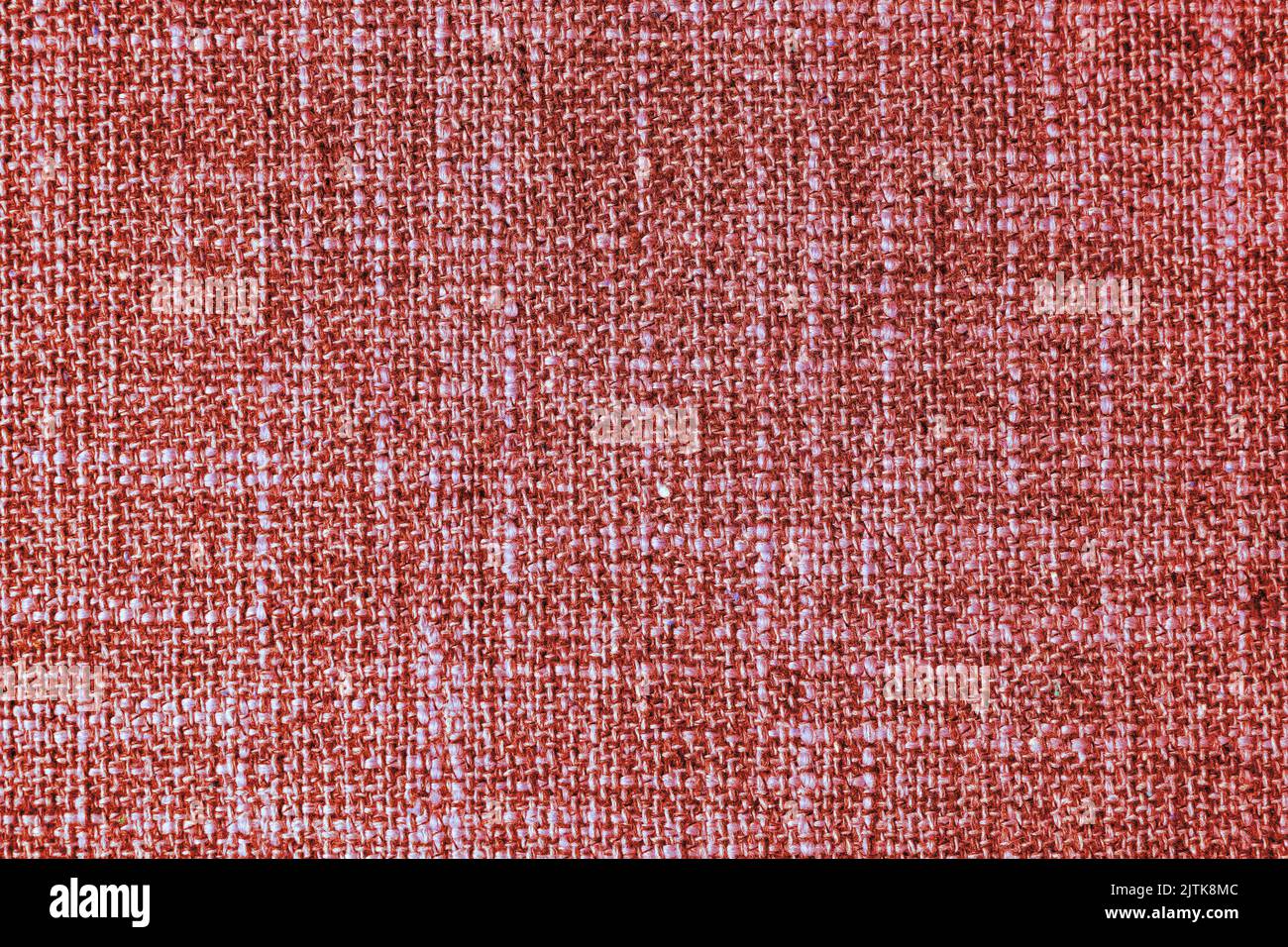 Close-up texture of natural red coarse weave fabric or cloth. Fabric ...