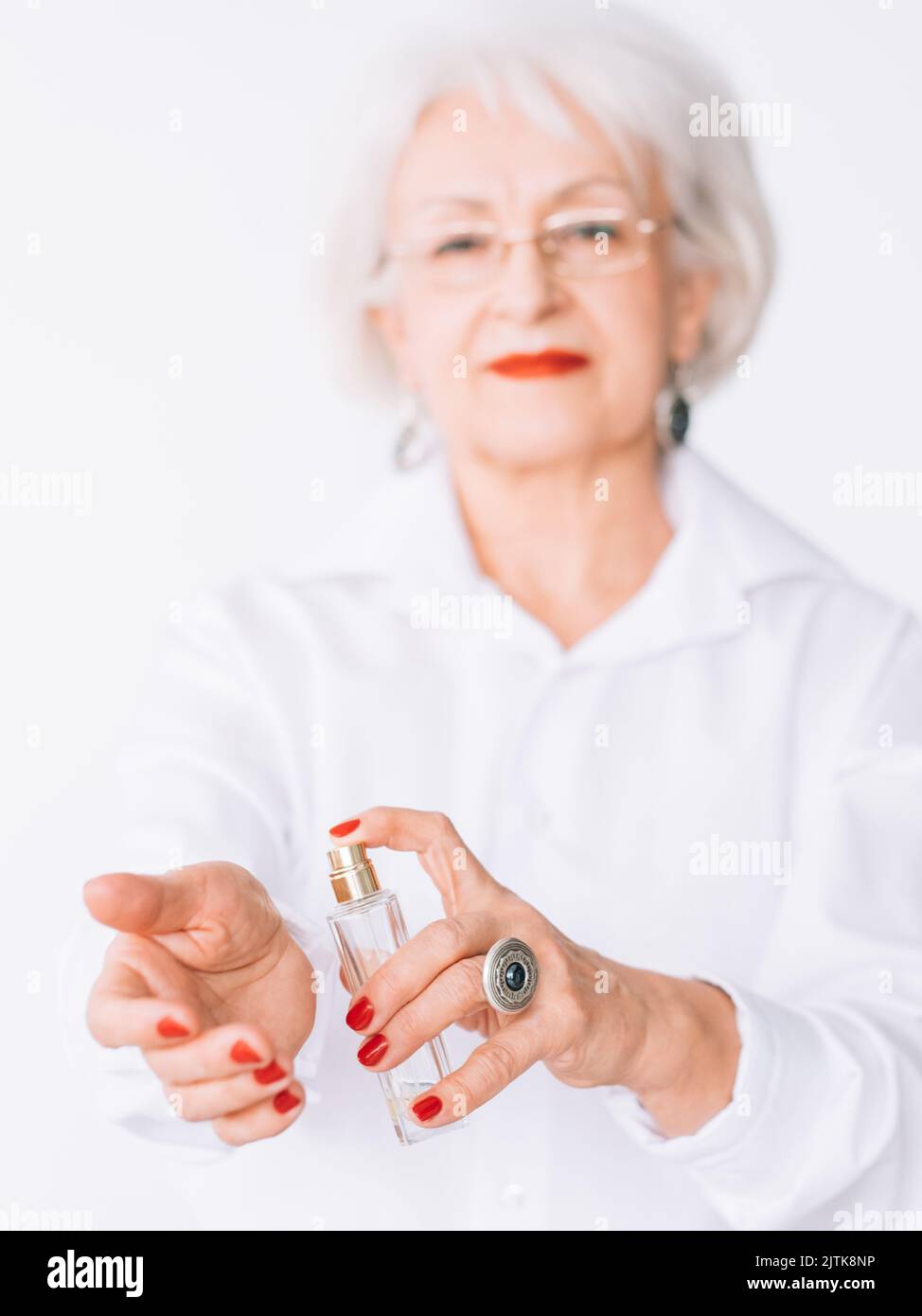 senior lady lifestyle fragrance choice expensive Stock Photo - Alamy