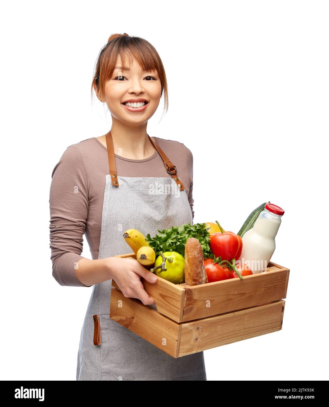 happy smiling female chef with food in wooden box Stock Photo - Alamy