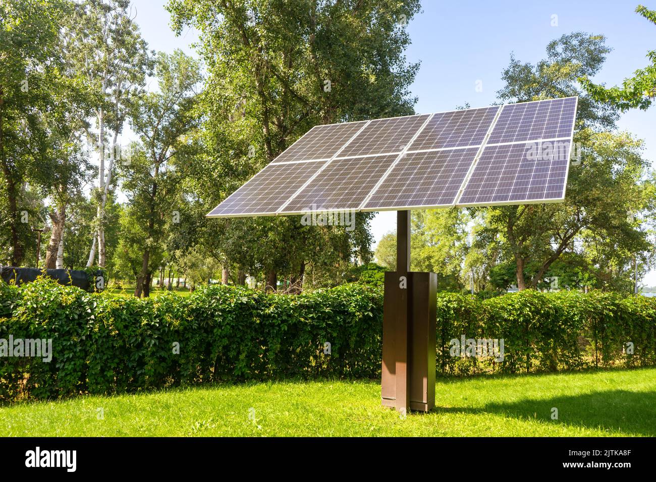 Solar panels in public park backgound. Photovoltaic modules for ...