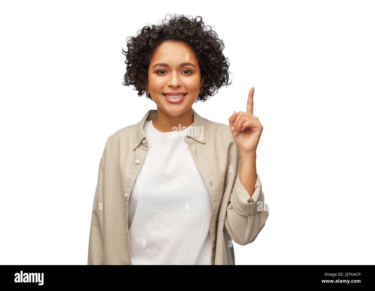 portrait of smiling woman pointing finger up Stock Photo - Alamy