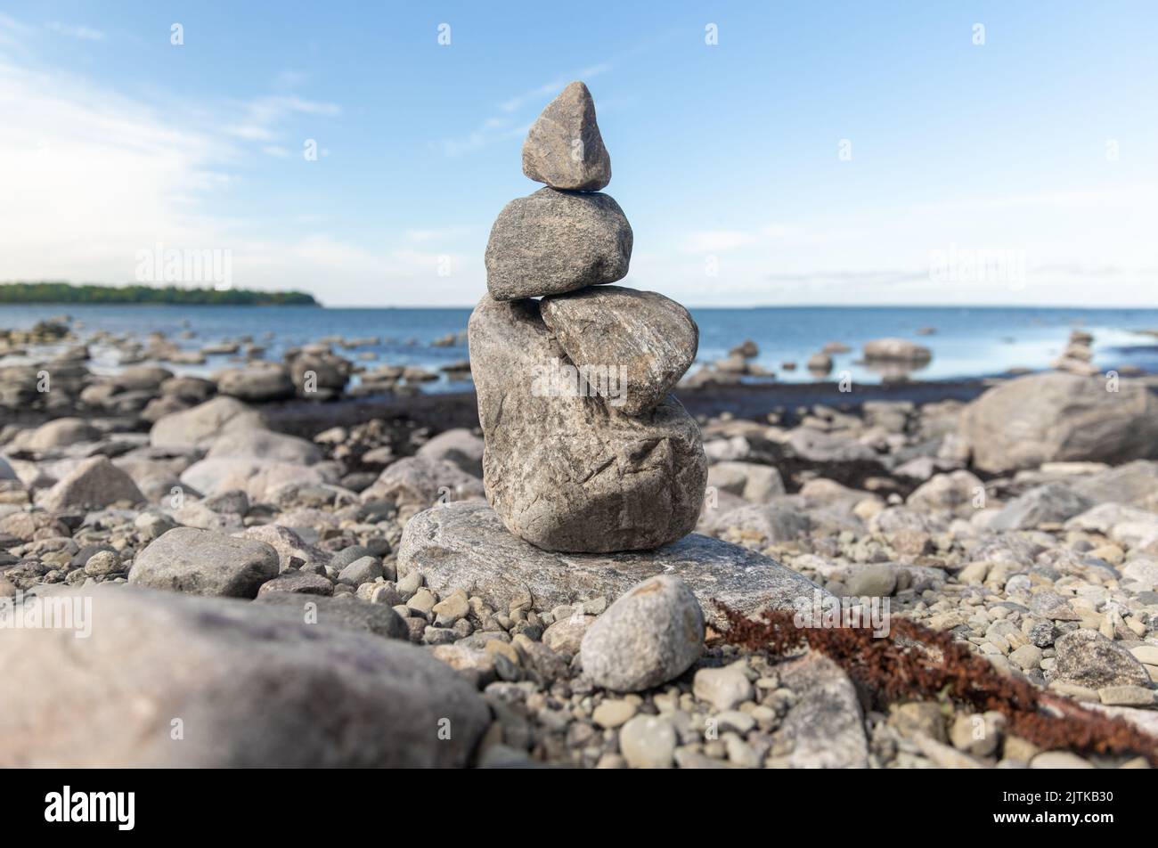 close up of stone pyramids or towers on beach Stock Photo - Alamy