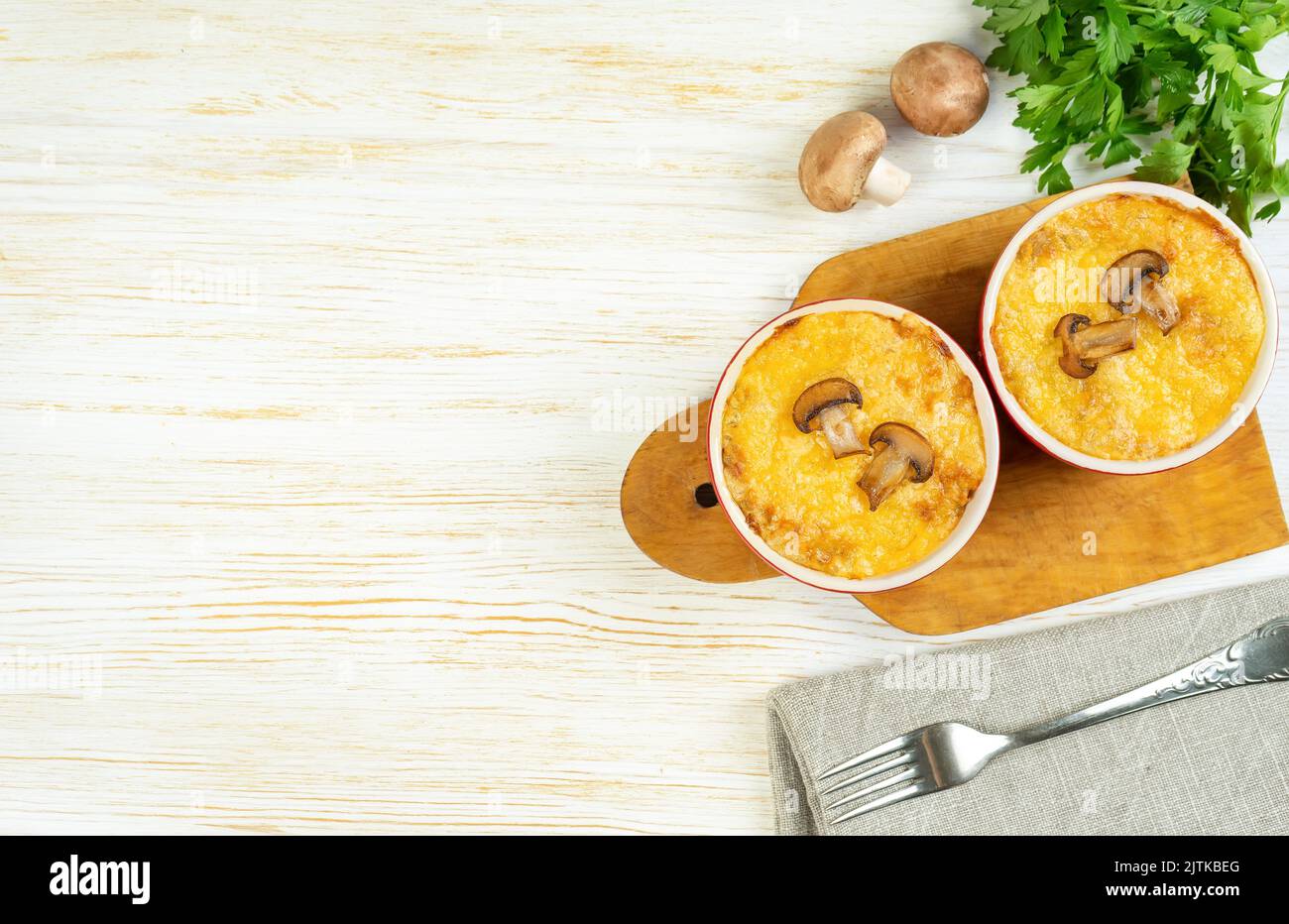 Chicken and mushroom casserole with golden crust, julienne with baked ...