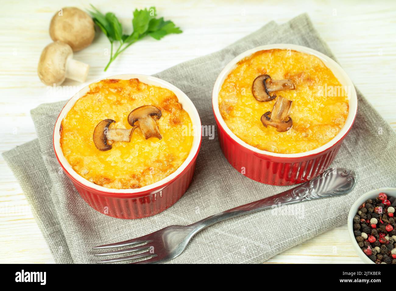 Chicken and mushroom casserole with golden crust, julienne with baked ...
