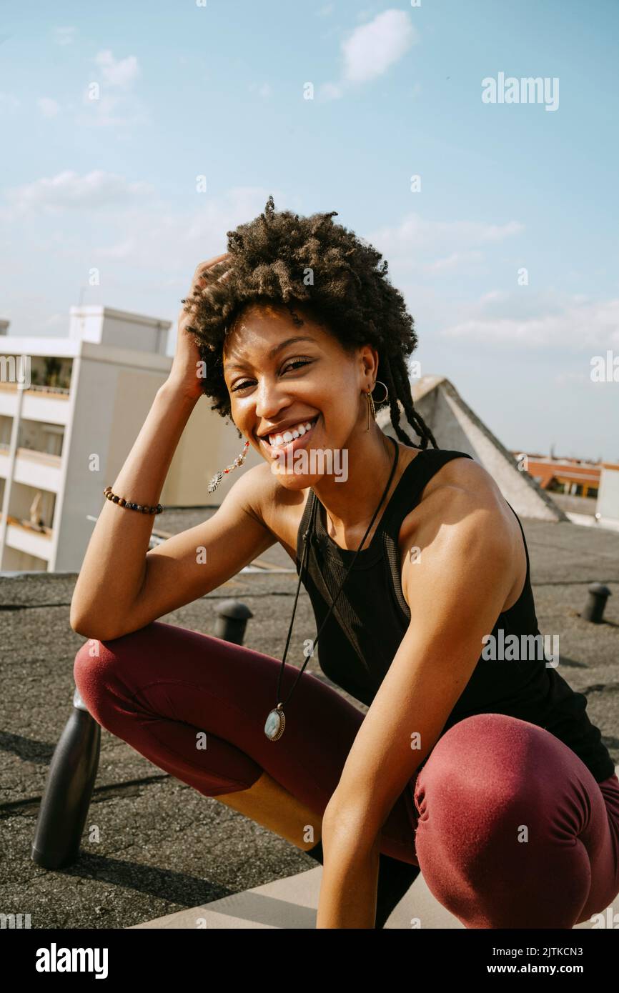 Woman crouching squatting young hi-res stock photography and images - Alamy